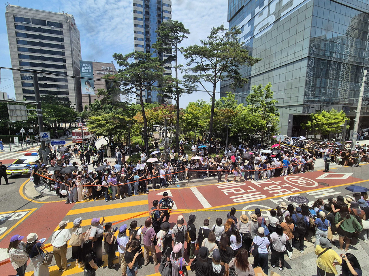 Countless ARMYs Gather at Yongsan HYBE Headquarters to Welcome BTS Jin