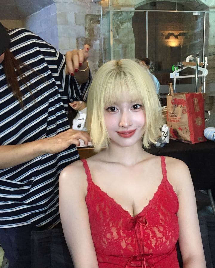 TWICE Momo Stuns in Bold Red Sheer Look, Showcasing Her Unique Style