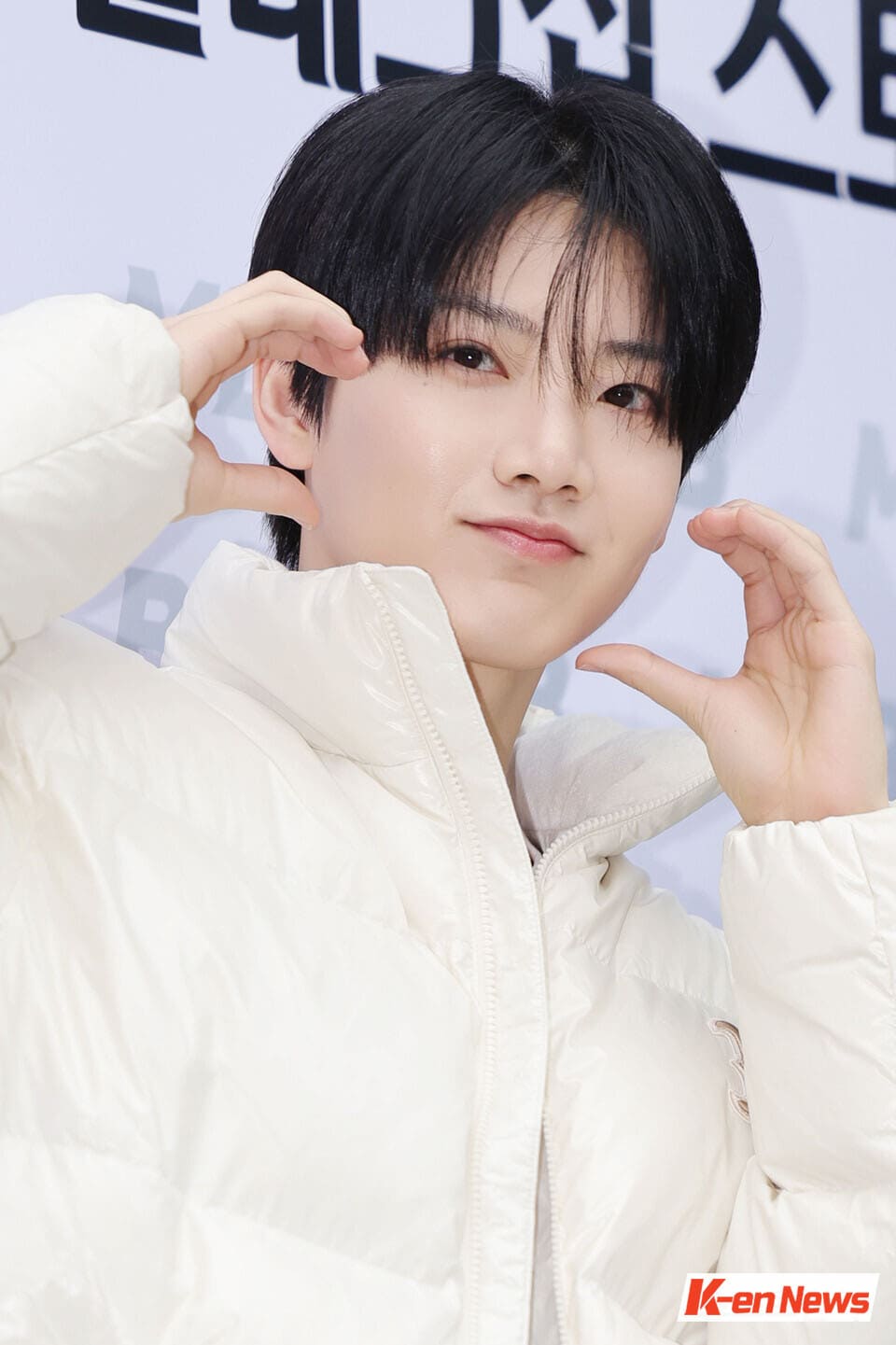 TREASURE's Junkyu and Yoshi Strike a Playful "V" Pose