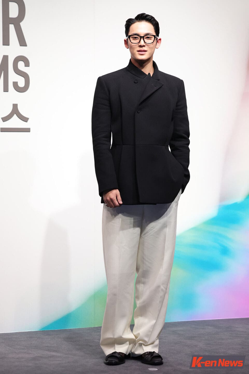 SEVENTEEN’s Mingyu Melts Hearts in Black Suit with Adorable Cheek Pose