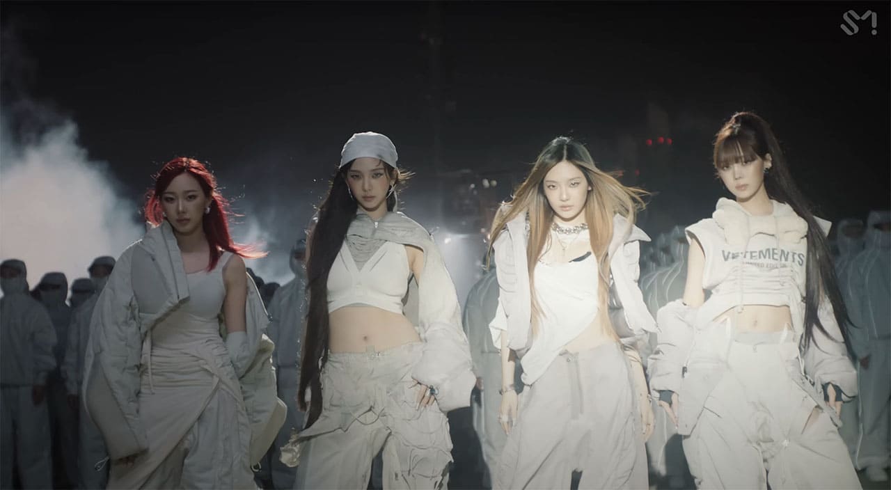 aespa Teases Blockbuster MV for ‘Dirty Work’ With Steel Factory Backdrop