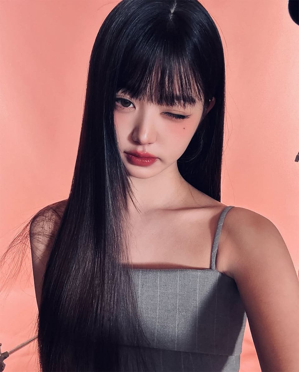 IVE’s Jang Won-young Charms with Signature Wink and Doll-Like Beauty