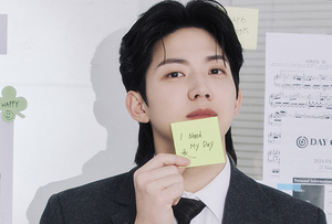 DAY6 Drummer Dowoon Stuns in Teaser Photo Ahead of Fan Meeting