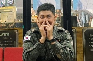 BTS RM Surprises with a Visit to His Birthday Cafe in Military Uniform